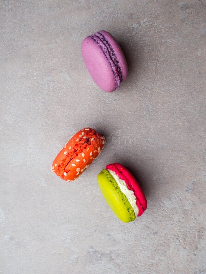 Assorted Colorful Macaroons Falling Cookies on Grey Background Stock ...
