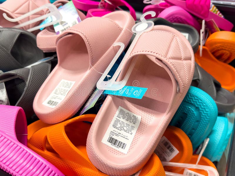 Assorted Colorful Sandals on Display in Store Editorial Photo - Image ...