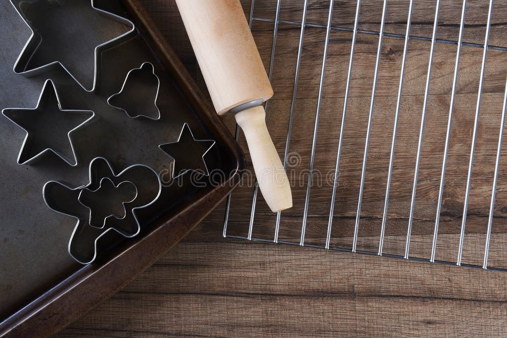 Assorted Cookie Cutters on a Baking Sheet with Rolling Pin and C Stock ...