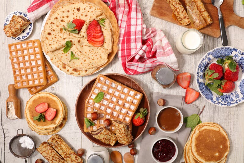 Assorted crepe and waffles stock photo. Image of breakfast - 125419136