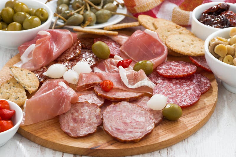 Assorted Deli Meat Snacks, Sausages and Pickles on Board Stock Photo ...