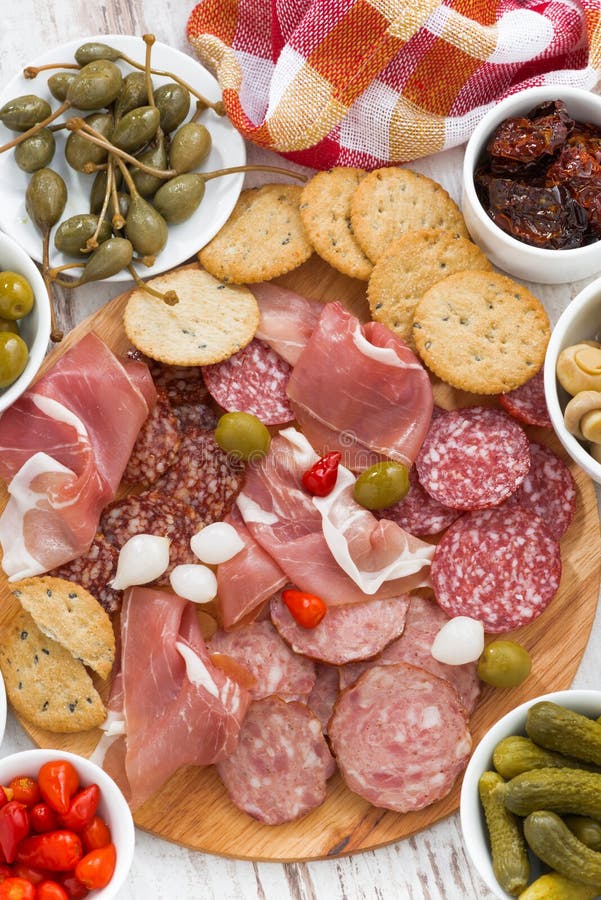 Assorted Deli Meats and a Plate of Cheese and Grapes, Isolated Stock ...