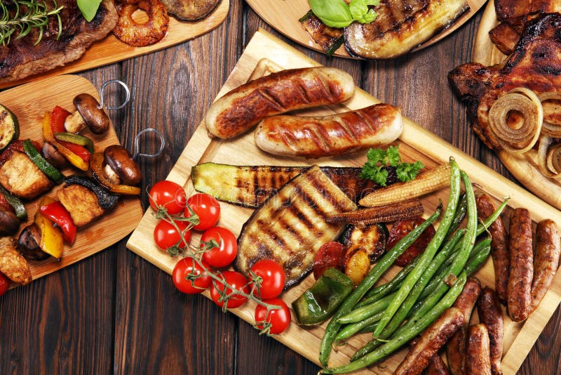 Assorted Delicious Grilled Meat with Vegetable on Rustic Table Stock ...