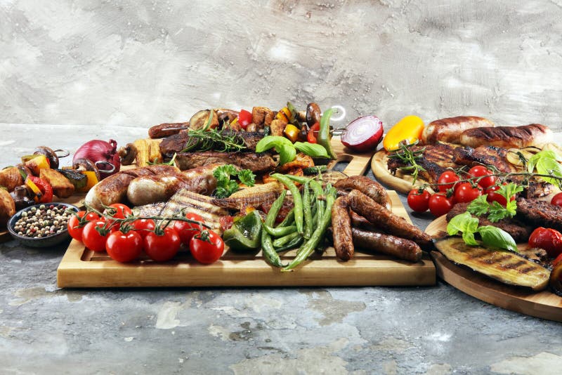 Assorted Delicious Grilled Meat with Vegetable on Rustic Table Stock ...
