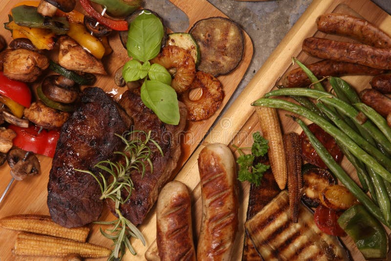 Assorted Delicious Grilled Meat with Vegetable on Rustic Table Stock ...