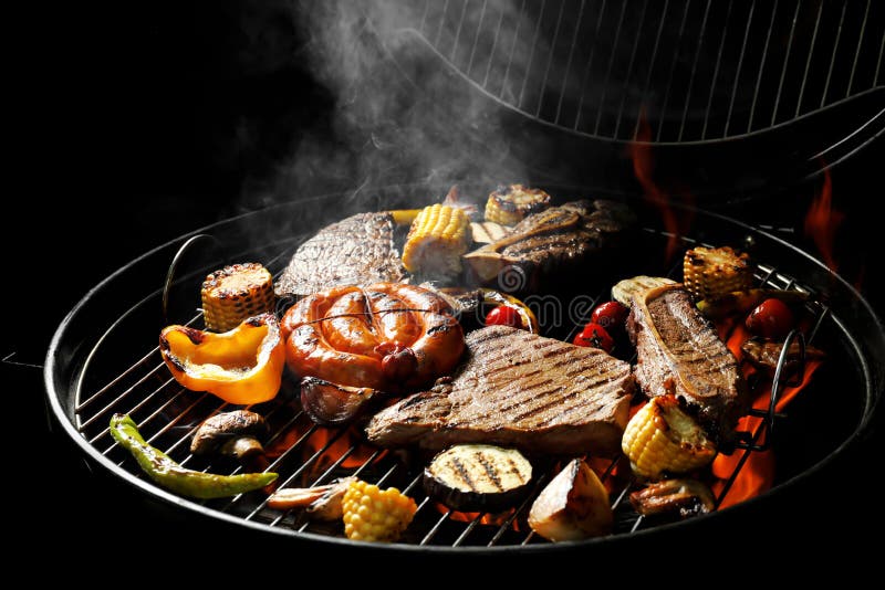 Assorted Delicious Grilled Meat and Vegetables Over Coal Barbecue Grill ...