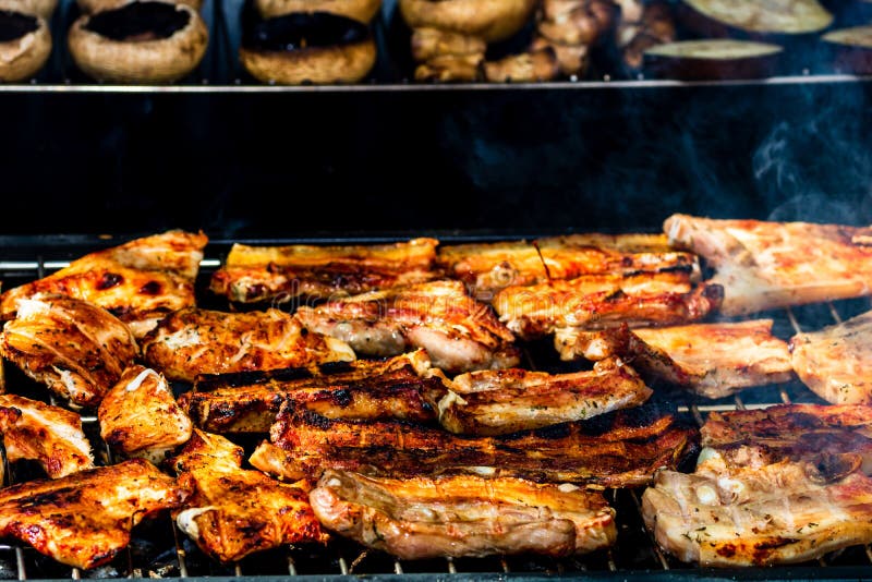 Assorted Delicious Meats Cooking on a Grill Stock Image - Image of ...