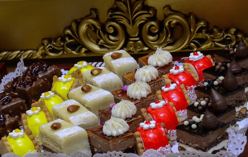 Assorted Different Mini Cakes with Cream, Stock Photo - Image of mini ...