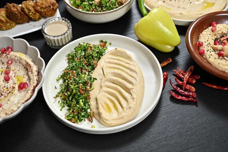 Various Types of Dips, Cheese and Vegetables Arranged in Bowls Stock ...