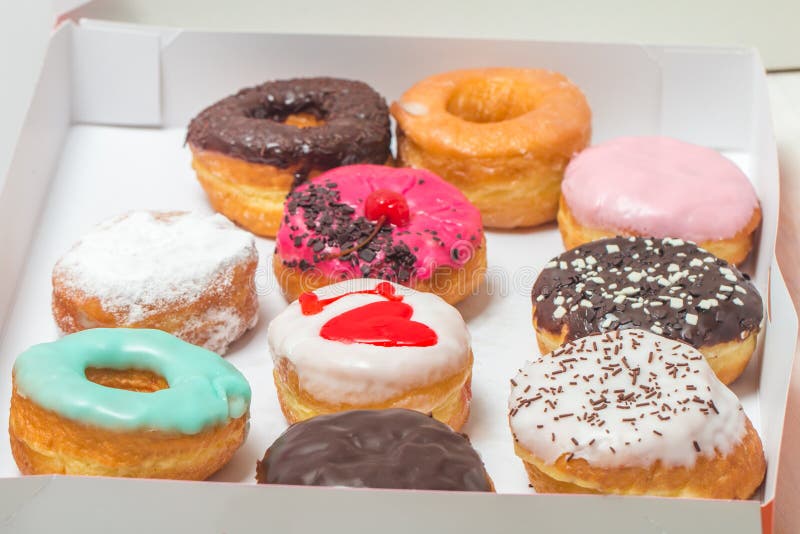 Assorted donuts in a box stock image. Image of donut - 59084519