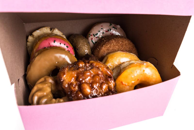 A Dozen Donuts stock image. Image of cream, cake, sweets - 49568649