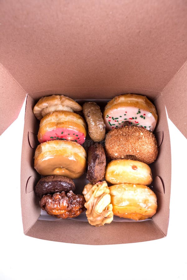 An Assorted Dozen Donuts in a Box Stock Photo - Image of flaky, edible ...