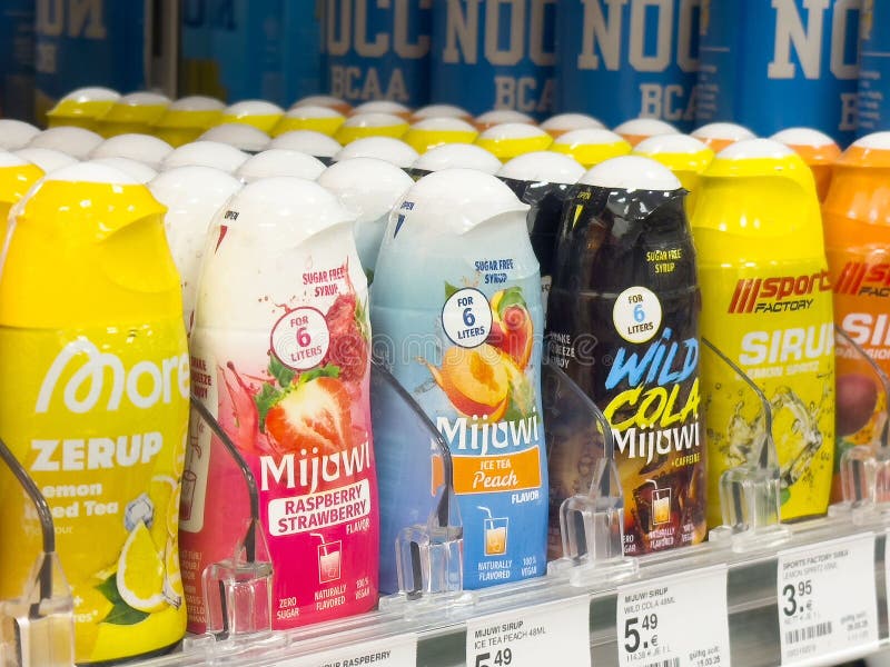 Assorted Drink Flavor Syrups on Store Shelf Display Editorial Stock ...