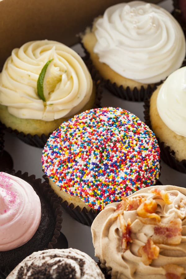 Assorted Fancy Gourmet Cupcakes with Frosting Stock Photo - Image of ...
