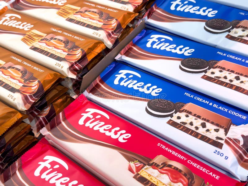 Assorted Finesse Chocolate Bars with Varied Flavors and Toppings ...