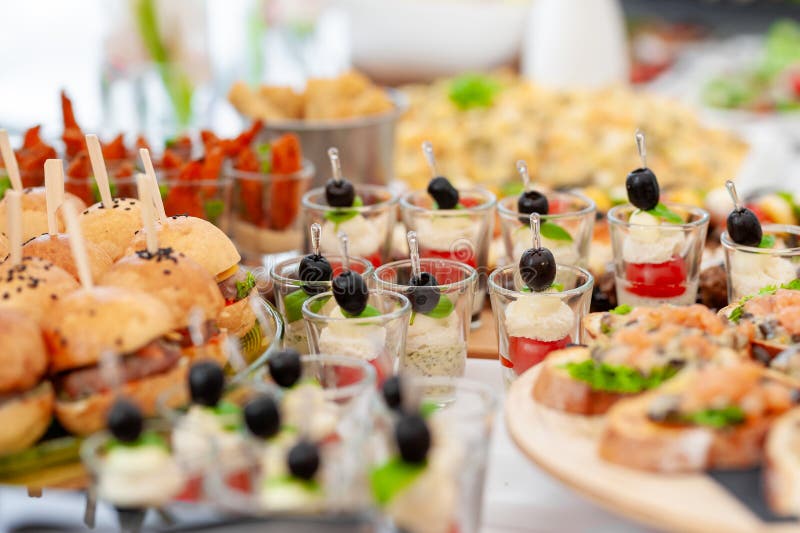Assorted Finger Foods and Appetizers Arranged on a Wedding Table for ...