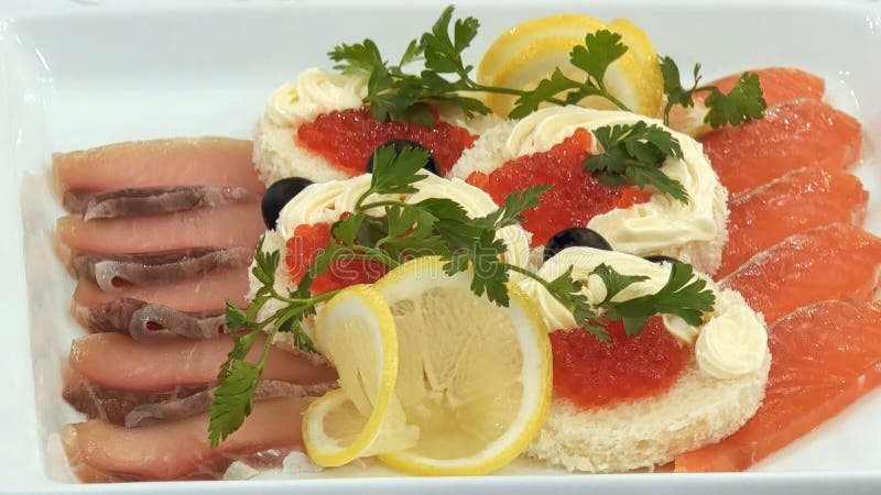 Assorted fish on a platter stock image. Image of assorted - 309402277
