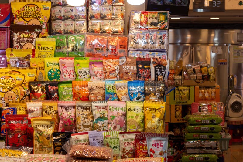 Assorted flavored almonds editorial stock photo. Image of assorted ...