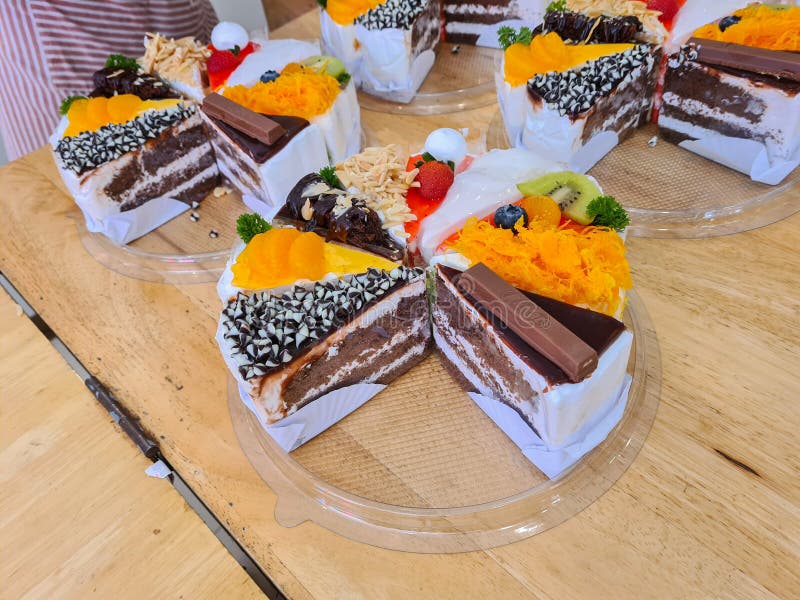 Assorted Flavored Cakes Being Arranged in a Box Stock Image - Image of ...