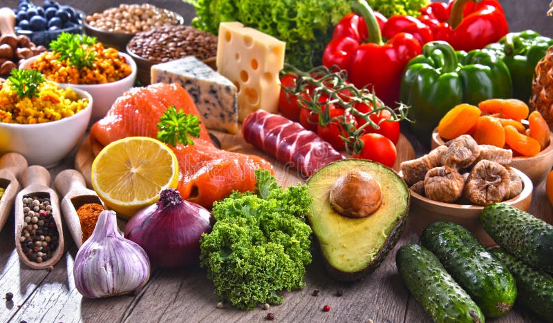 Assorted Food Products on Kitchen Table Stock Photo - Image of dairy ...