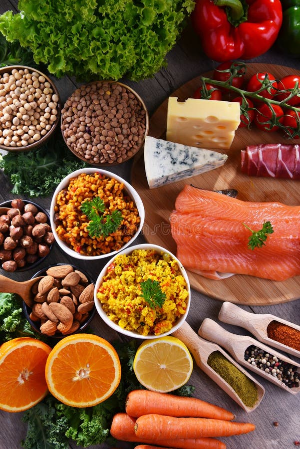 Assorted Food Products on Kitchen Table Stock Photo - Image of cooking ...