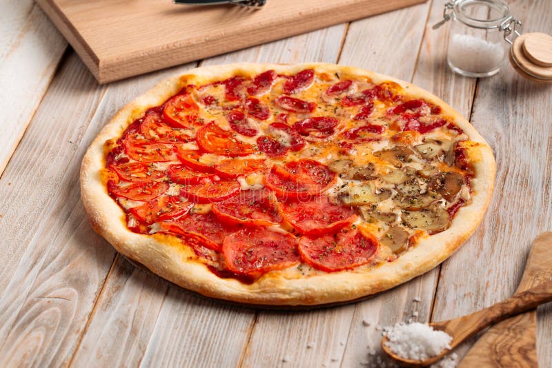 Assorted Four Seasons Pizza on the Wooden Table Stock Image - Image of ...