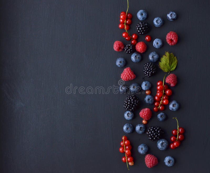 Assorted Fresh Berries Isolated on Black Background. Copyspace Stock ... Assorted Fresh Berries Isolated on Black Background. Copyspace Stock ...