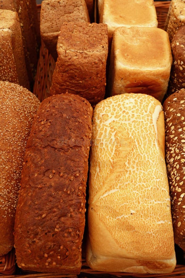 Assorted Fresh Bread Loaves on Retail Display Stock Photo - Image of ...