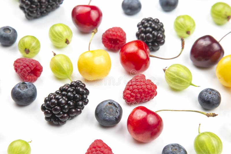 Assorted Fresh Different Berries on a White Background. Useful Vitamin ...