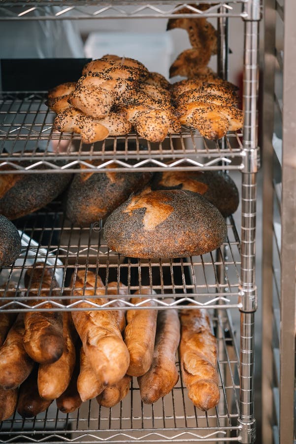 Assorted Freshly Baked Bread Types Displayed on the Oven Racks. Stock ...