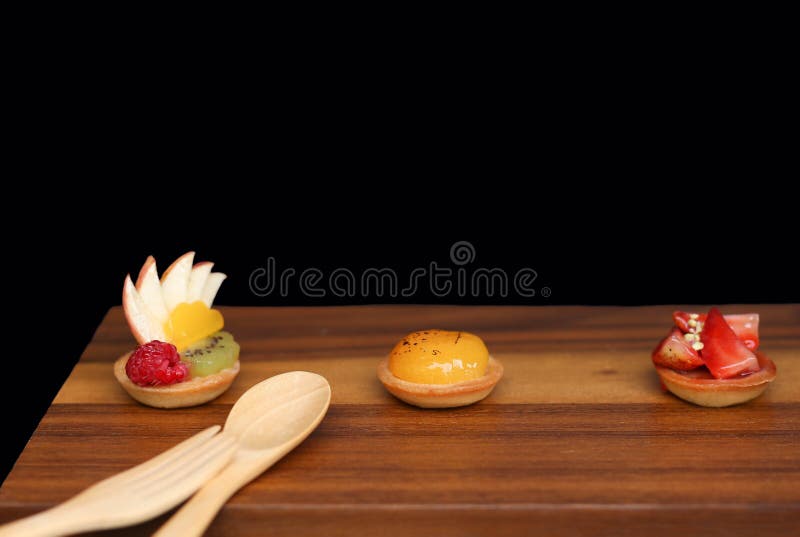 Assorted Fruit Tartlets Wooden Board Stock Photos - Free & Royalty-Free ...
