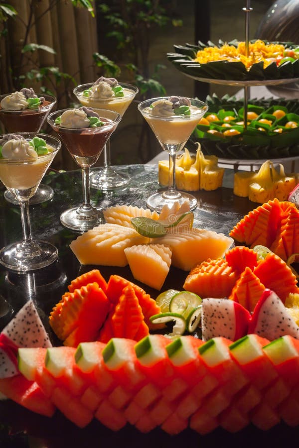 Assorted Fruits And Dessert On Buffet Line. Stock Photo - Image of line ...