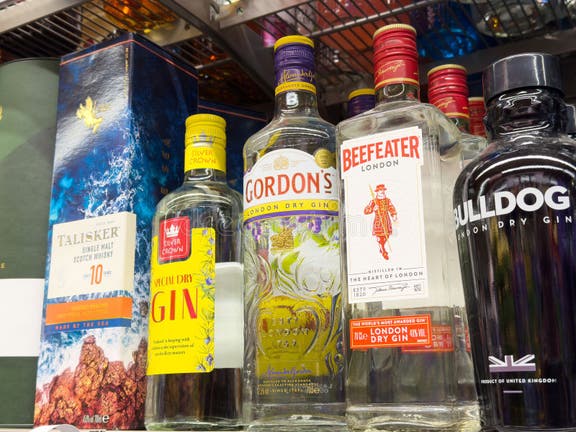 Assorted Gin and Whisky Bottles on Display Shelf Editorial Stock Photo ...