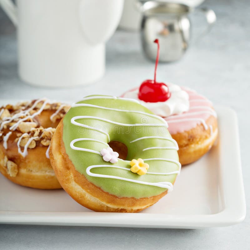 Assorted Glazed Fried Donuts on a Plate Stock Image - Image of junk ...