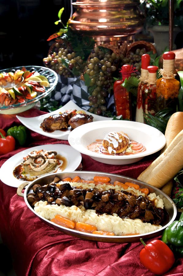 Assorted Gourmet Entrees on Display Table Stock Photo - Image of ...