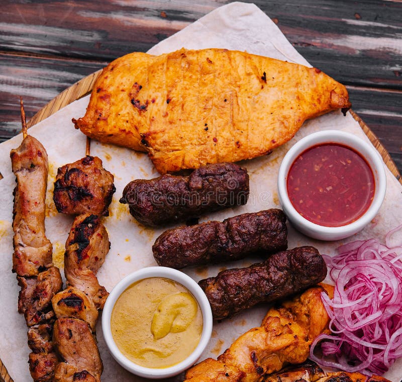 Assorted grilled meats stock photo. Image of assortment - 320169712