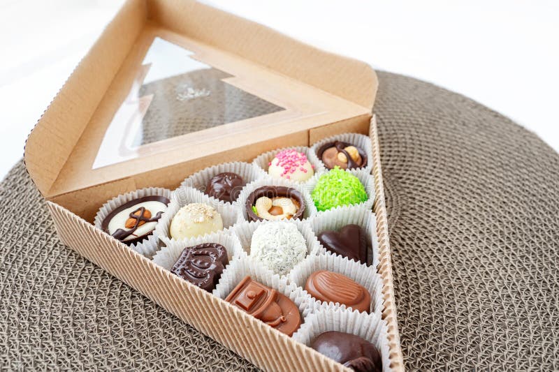 Assorted Handmade Chocolates. Candy in a Triangular Box Stock Photo ...