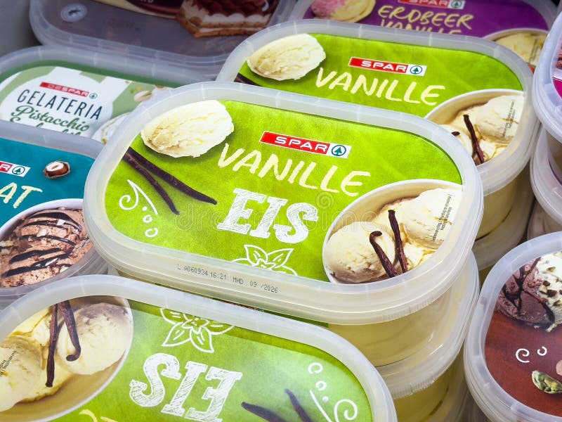 Assorted Ice Cream Tubs with Vanilla and Chocolate Flavors on Display ...