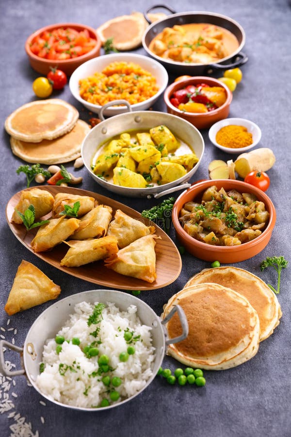 Assorted of indian food stock image. Image of rice, cooked - 216582695