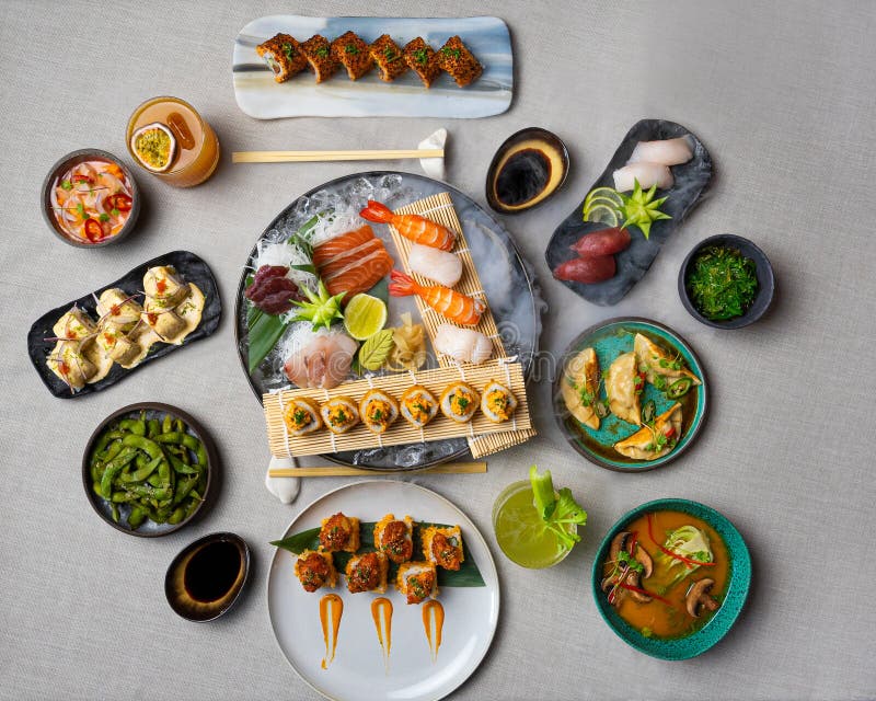 Assorted Japanese Sushi Ans Sashimi on a Table Stock Photo - Image of ...