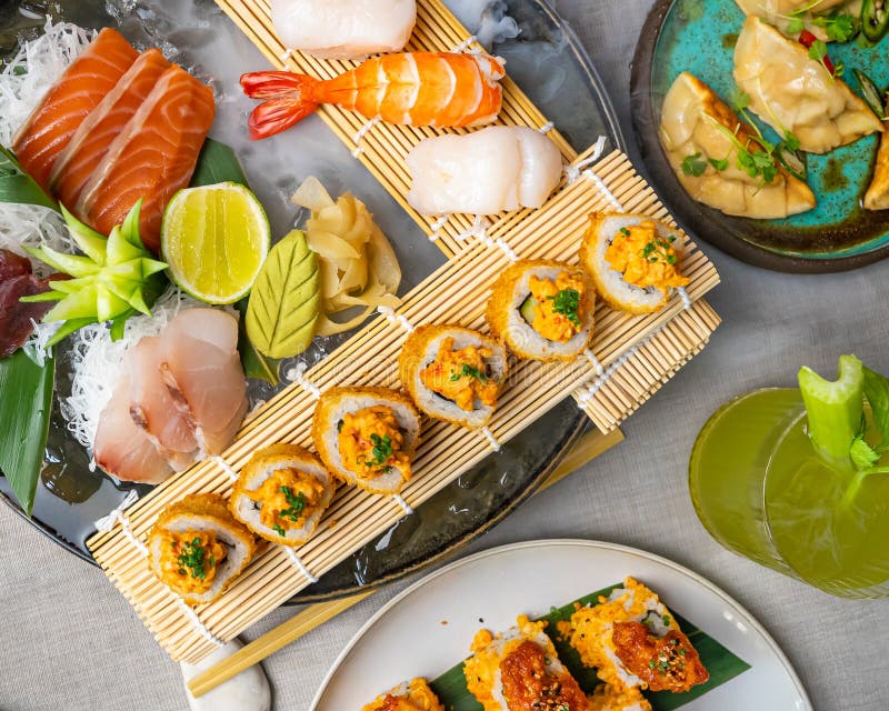 Assorted Japanese Sushi Ans Sashimi on a Table Stock Image - Image of ...