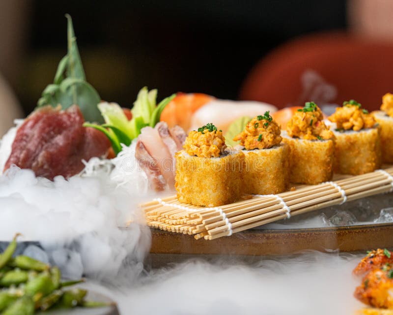 Assorted Japanese Sushi Ans Sashimi on a Table Stock Image - Image of ...
