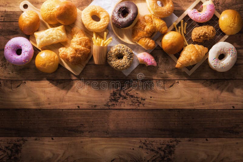 Assorted Junk Food Multiple Type on Wooden Table of Top View with Copy ...