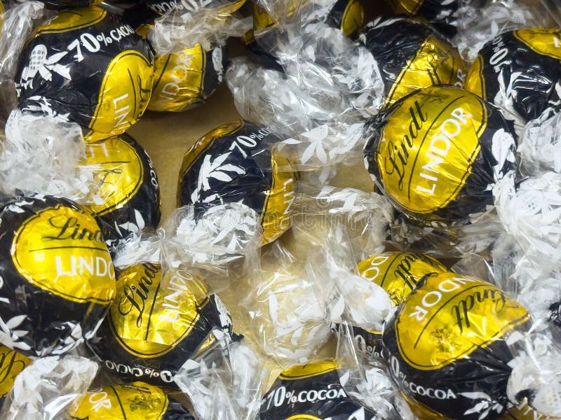 Assorted Lindt Lindor Chocolate Truffles Wrapped in Gold and Black ...