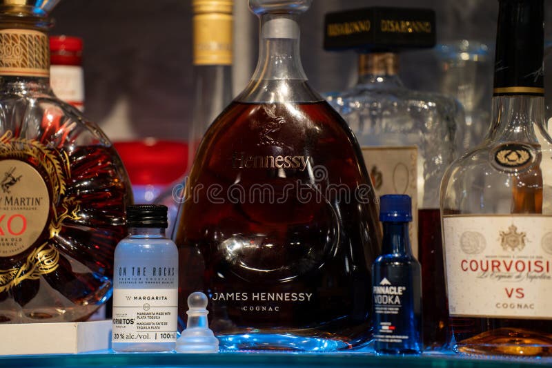 Assorted Liquor Bottles on a Bar Shelf. Editorial Photography - Image ...