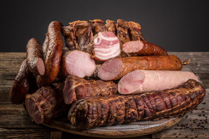 Assorted Meat Products Including Ham and Sausages. Ariety of Processed ...