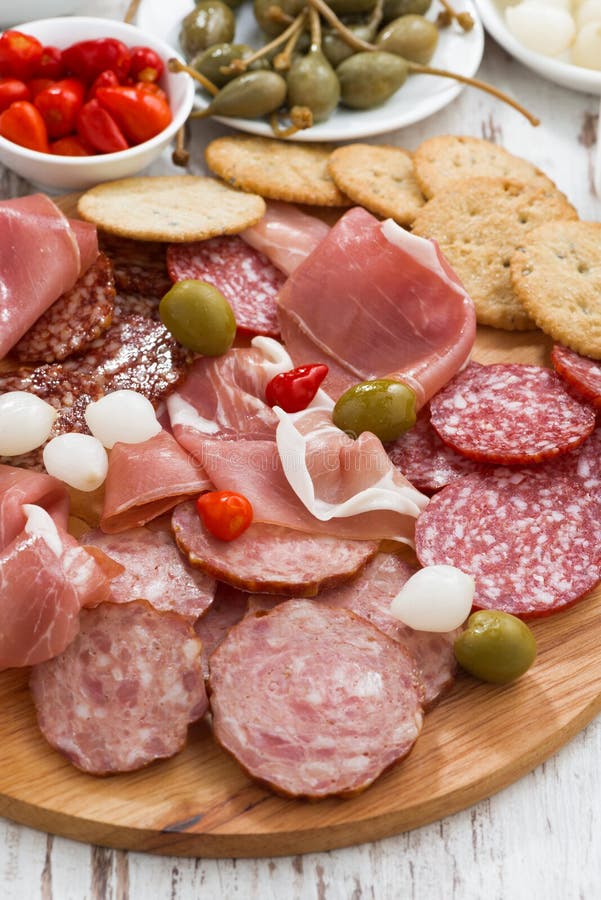 Assorted Meat Snacks, Sausages and Pickles on Wooden Board Stock Photo ...