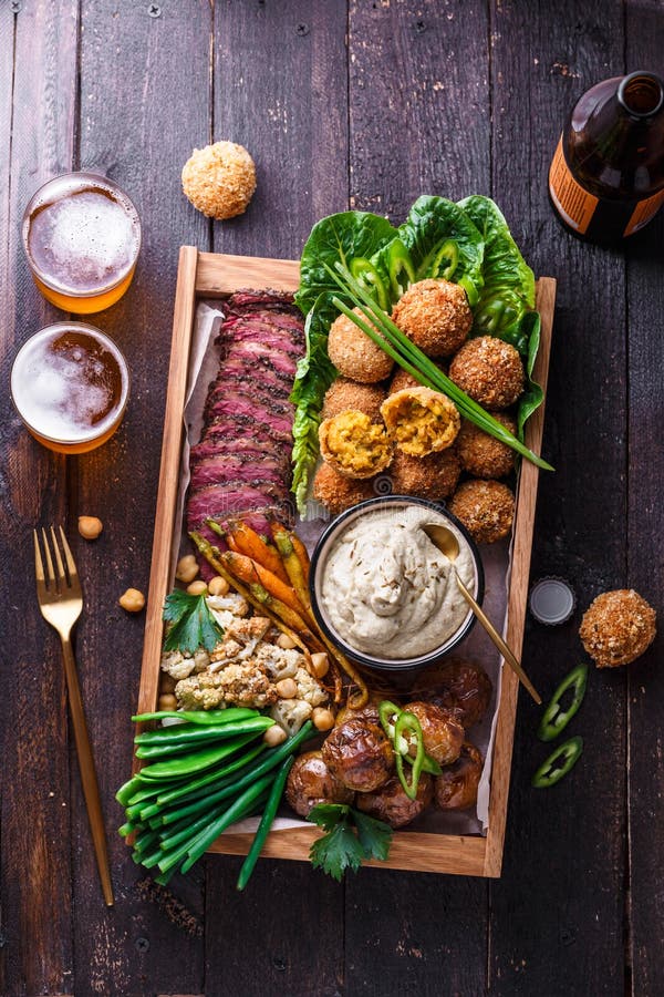 Assorted Middle Eastern Dishes: Falafel, Meat, Potato, Cauliflower and ...