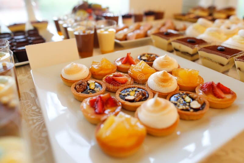 Assorted Mini Cakes on a Plate Stock Photo - Image of banquet, colorful ...