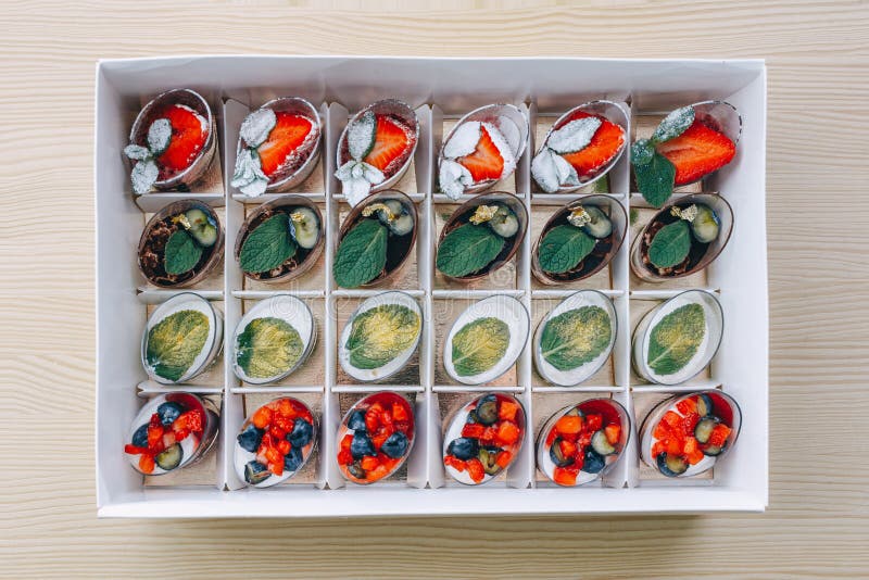 Assorted Mini Desserts in Box Display Stock Photo - Image of catering ...